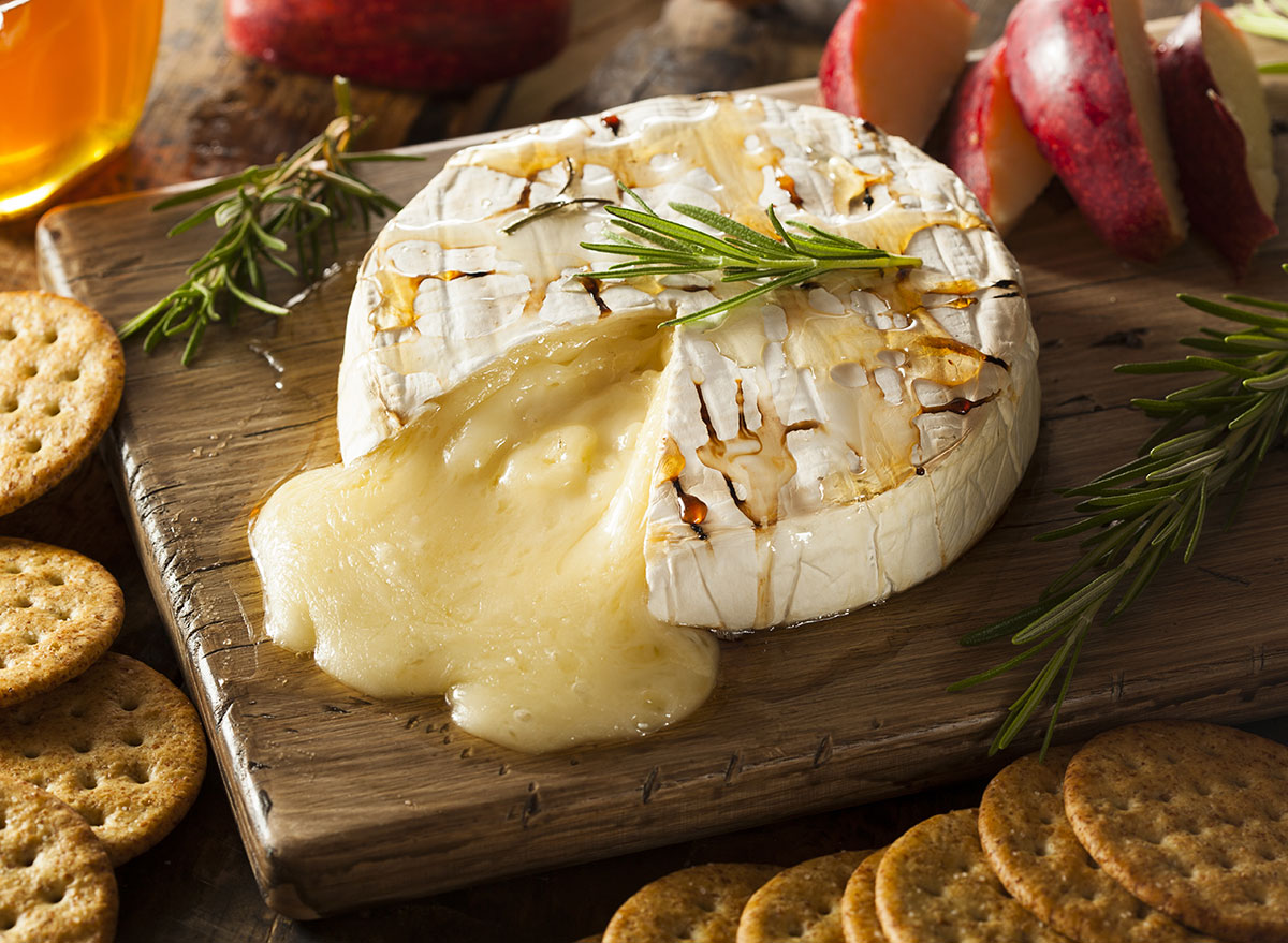 12 Side Effects of Eating Too Much Cheese, According to Dietitians | Dr ...
