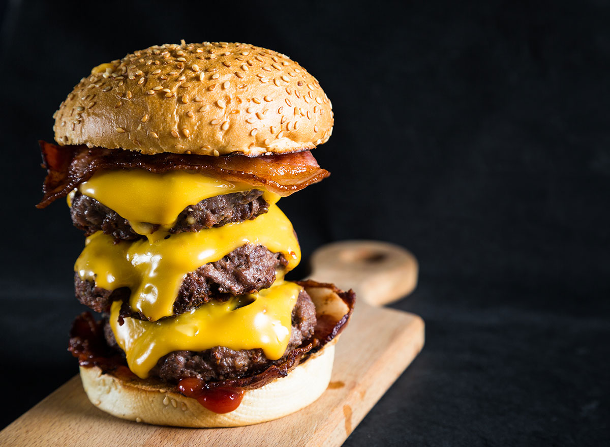 12 Side Effects of Eating Too Much Cheese, According to Dietitians | Dr ...