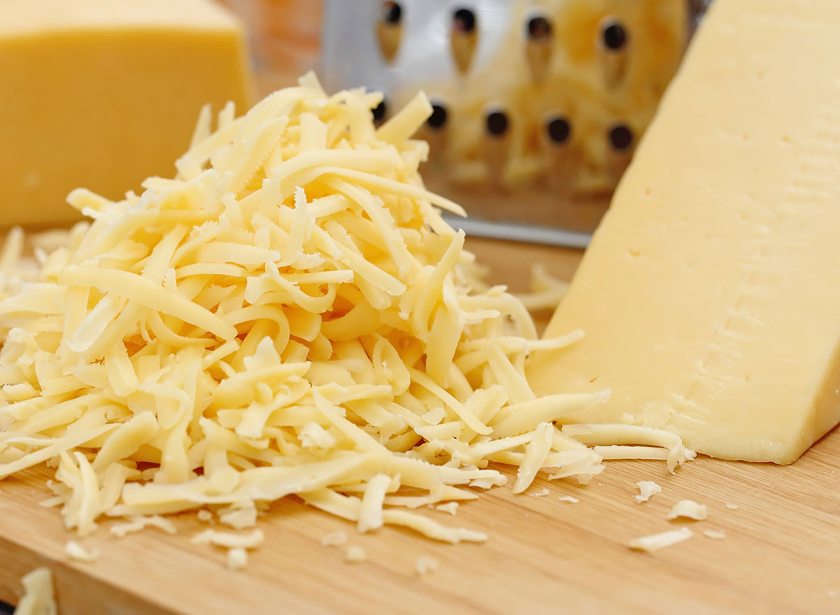12 Side Effects of Eating Too Much Cheese, According to Dietitians | Dr ...