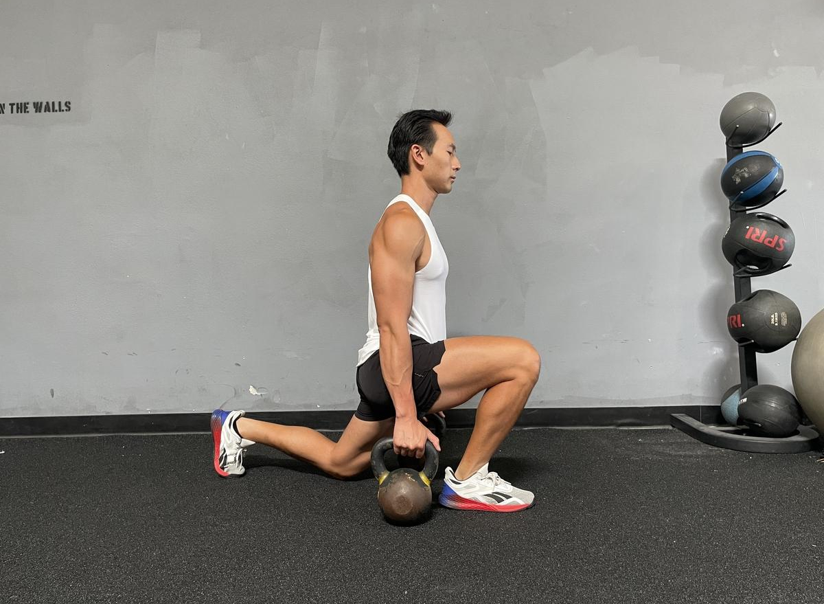 Shrink Your Belly Overhang for Good With This Kettlebell Workout — Eat This Not That