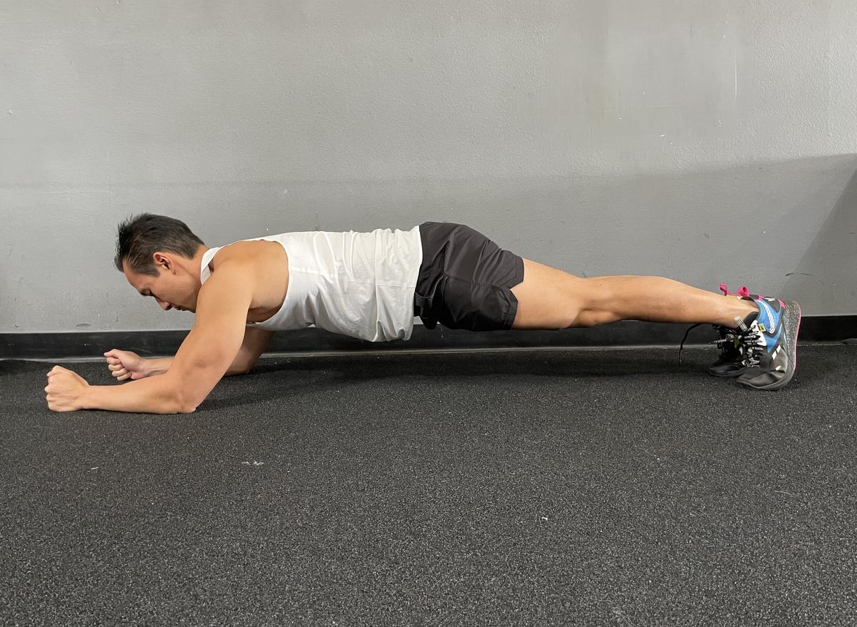 The Best Plank Exercises to Target Belly Fat, According to a Trainer