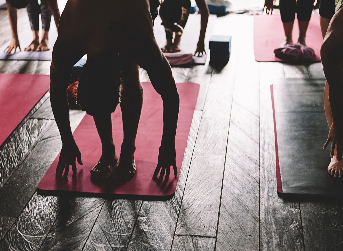 What Is Hot Yoga? 4 Benefits Of Sweating it Out — Eat This Not That