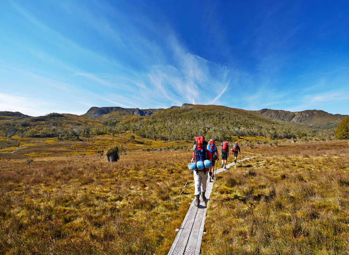 12 Best 'Rucking' Tips To Maximize Your Walking Calorie Burn