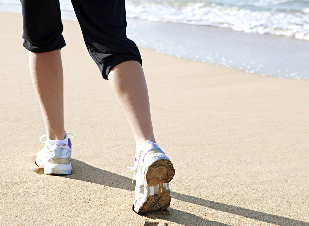 10 Ways To Turn Your Beach Walk into a Full-Body Workout
