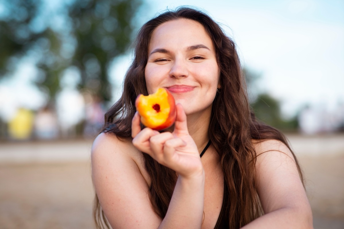 One Major Side Effect of Eating Peaches, Says Dietitian — Eat This Not That