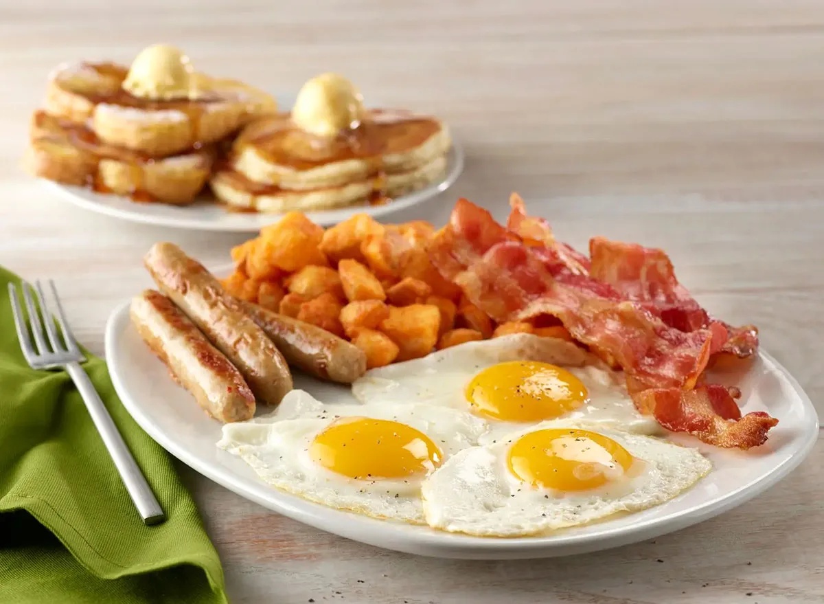 5 Chain Restaurants Famous for Breakfast Platters Piled High With Bacon ...